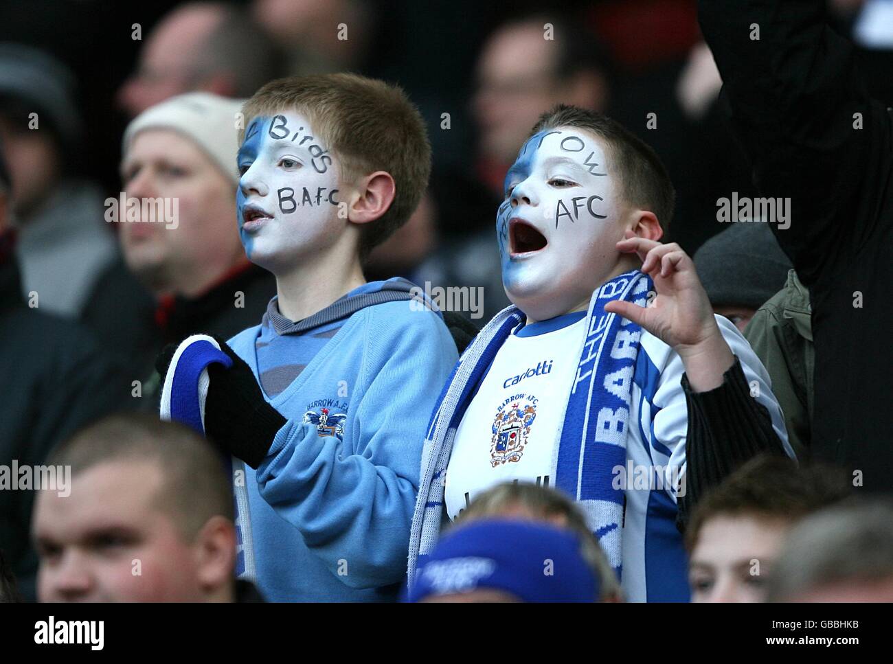 Barrow fans show support for their side in the stands hi-res stock ...
