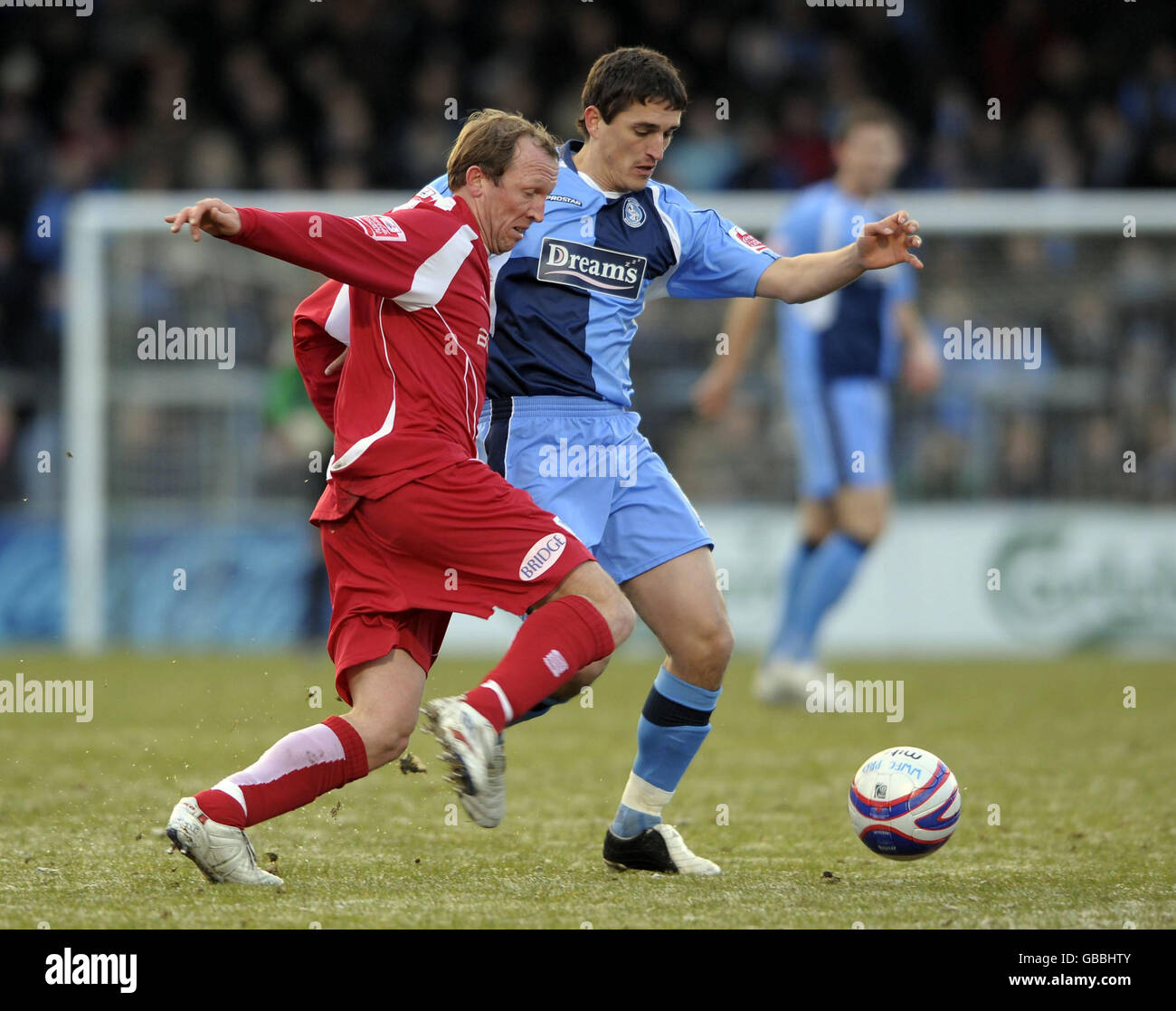 Wycombe's Craig Woodman in action with Bury's Andy Morrell during the ...