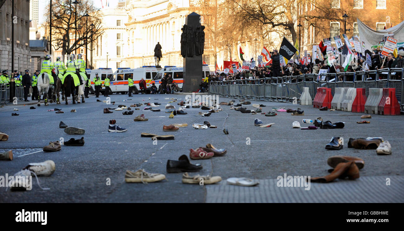 Hundreds of shoes lie in the street in Whitehall after protesters ...