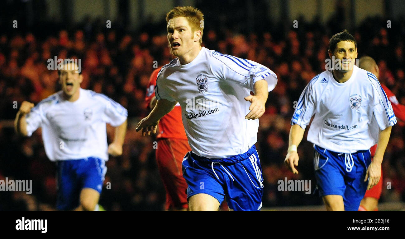 Barrow's Jason Walker (centre) celebrates after scoring their first ...