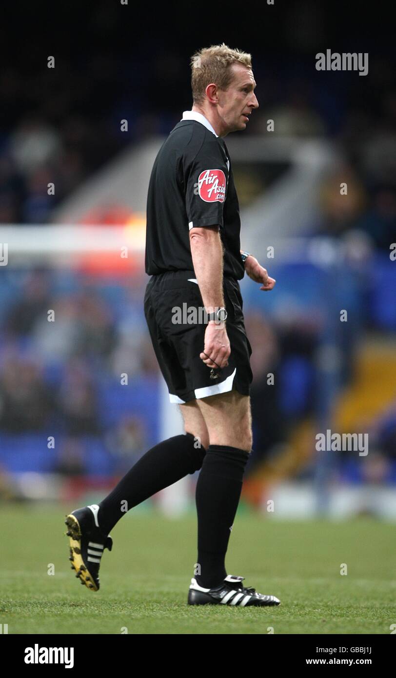 Referee Keith Hill leaves the pitch after picking up an injury Stock ...