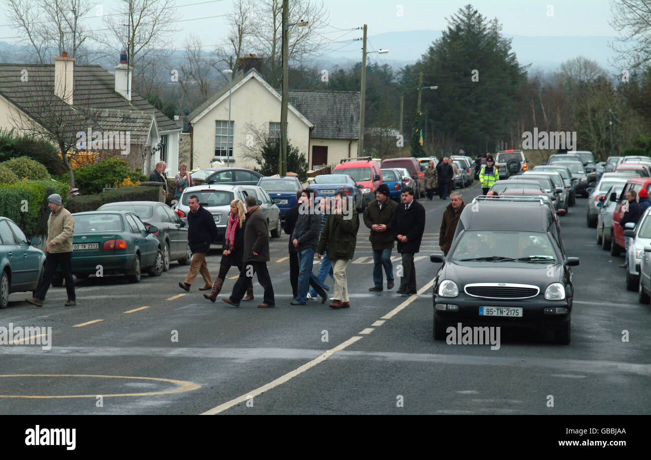 The hearse carrying the coffin of crash victim, Aidan O'Brien, makes ...