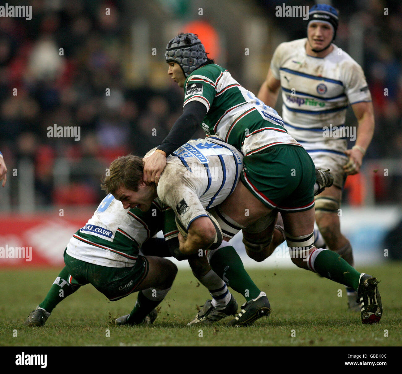 Leicester Tigers' Julien Dupuy and Marco Wentzel tackle Bath Rugby's ...