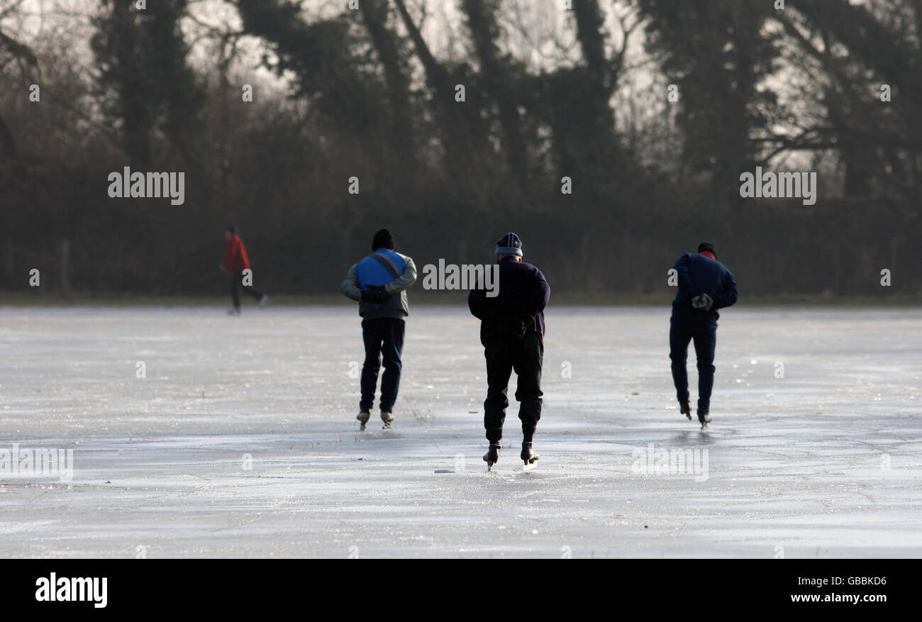 Fen skaters enjoys the cold snap by skating on a flooded field in the ...