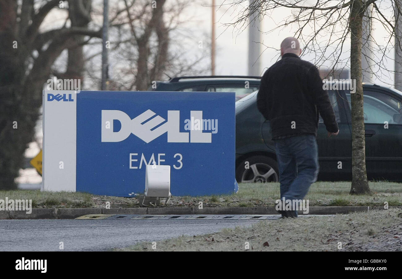 An employee at computer giant Dell arrives for work at the plant in ...