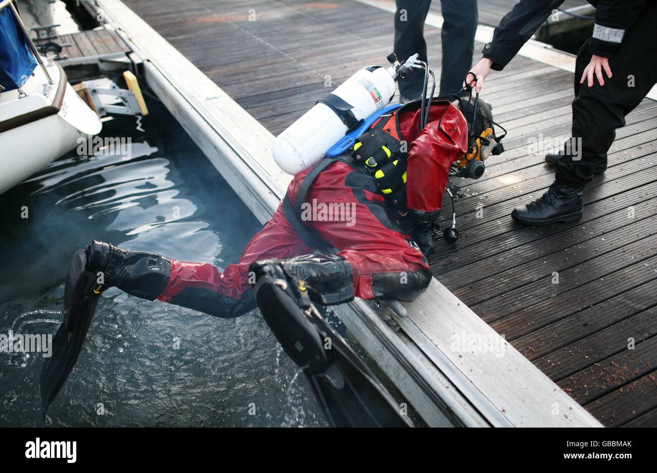 Full length suit water cylinder mangis hi-res stock photography and ...