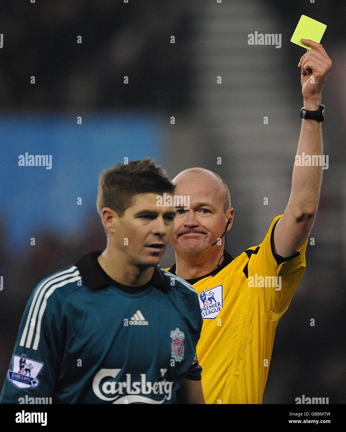 Soccer football yellow card booking mid length half hi-res stock ...