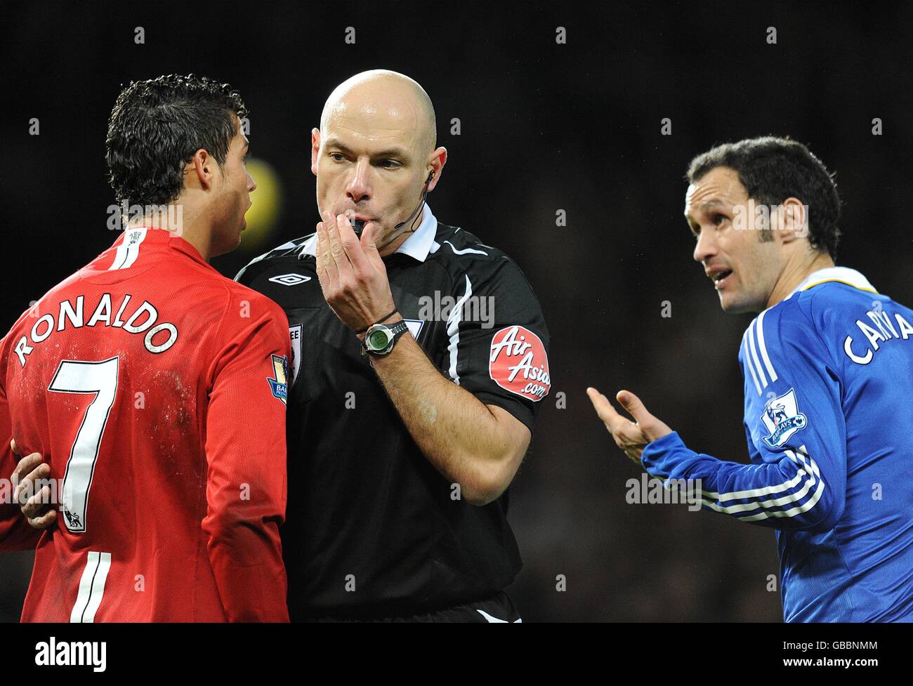 Referee Howard Webb (center) steps in as Chelsea's Ricardo Carvalho and ...