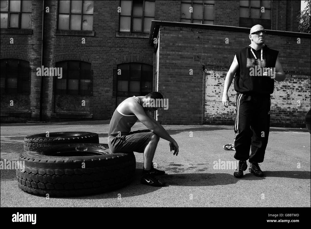 Former WBU Middleweight Champion Anthony Farnell (right), walks past a ...