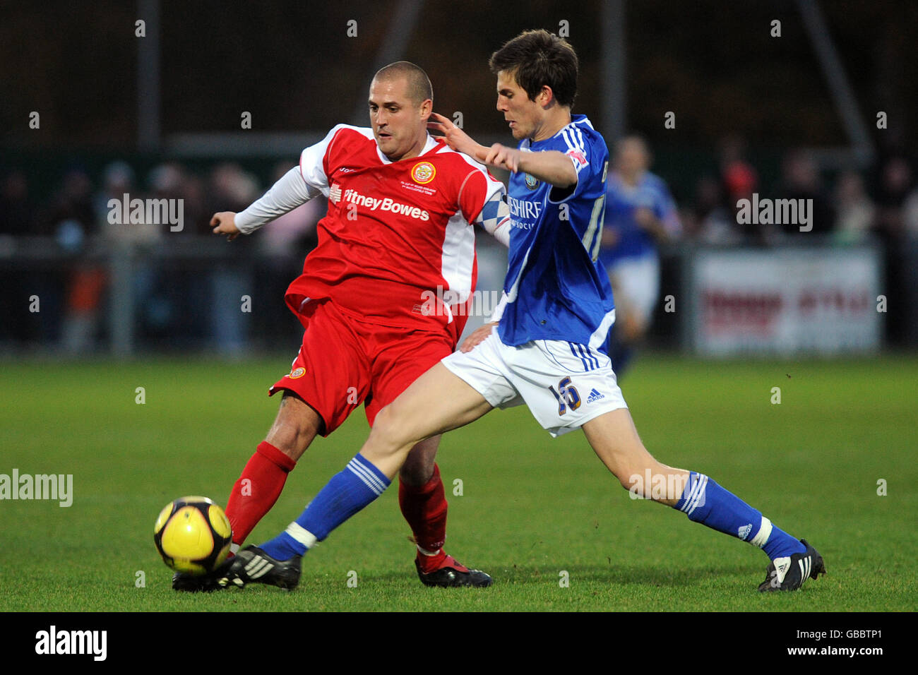 Harlow Town's James Bunn (left) and Macclesfield Town's Shaun Brisley ...
