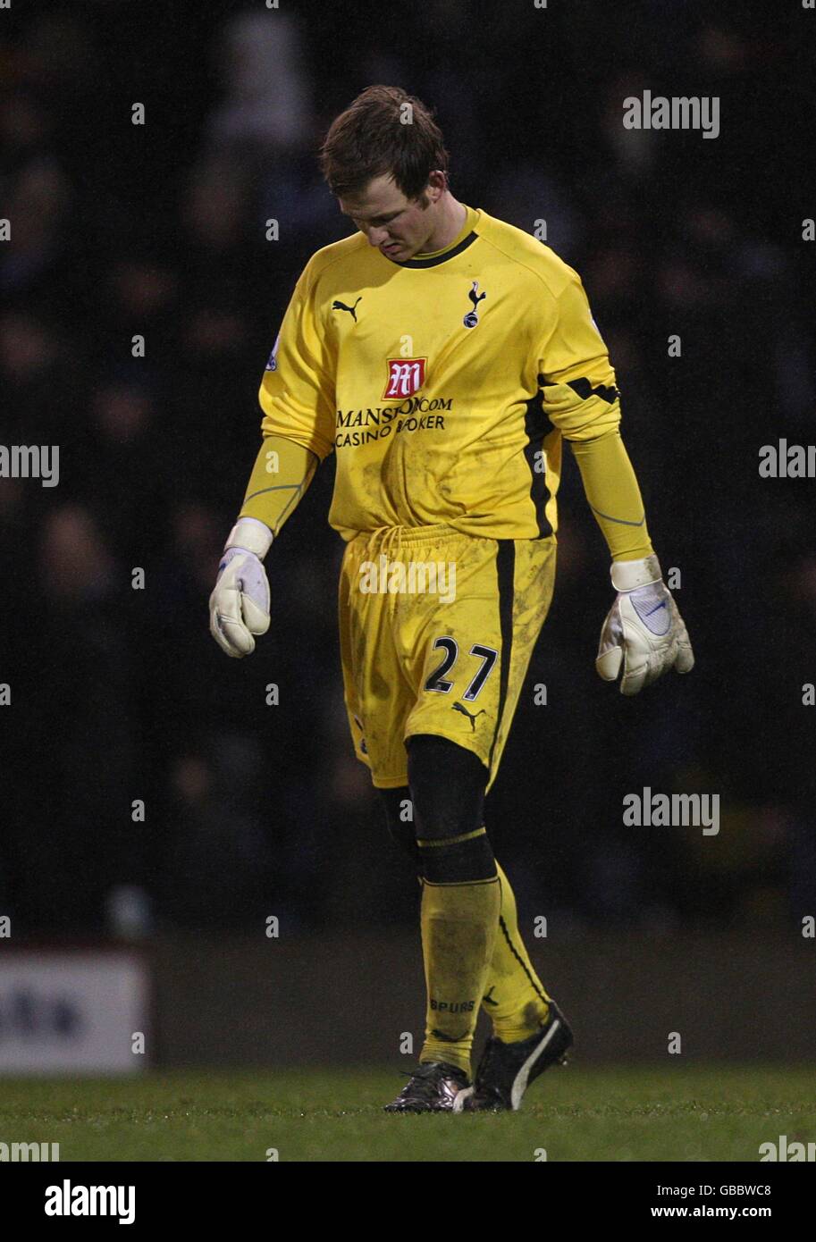 Tottenham hotspur goalkeeper ben alnwick walks dejected across the ...