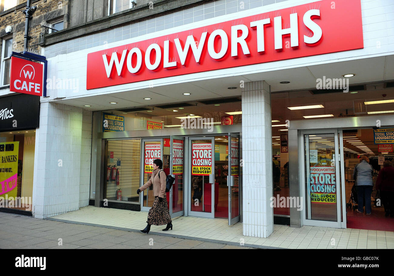 A customer leaves the Woolworths store in Harrogate, North Yorkshire ...