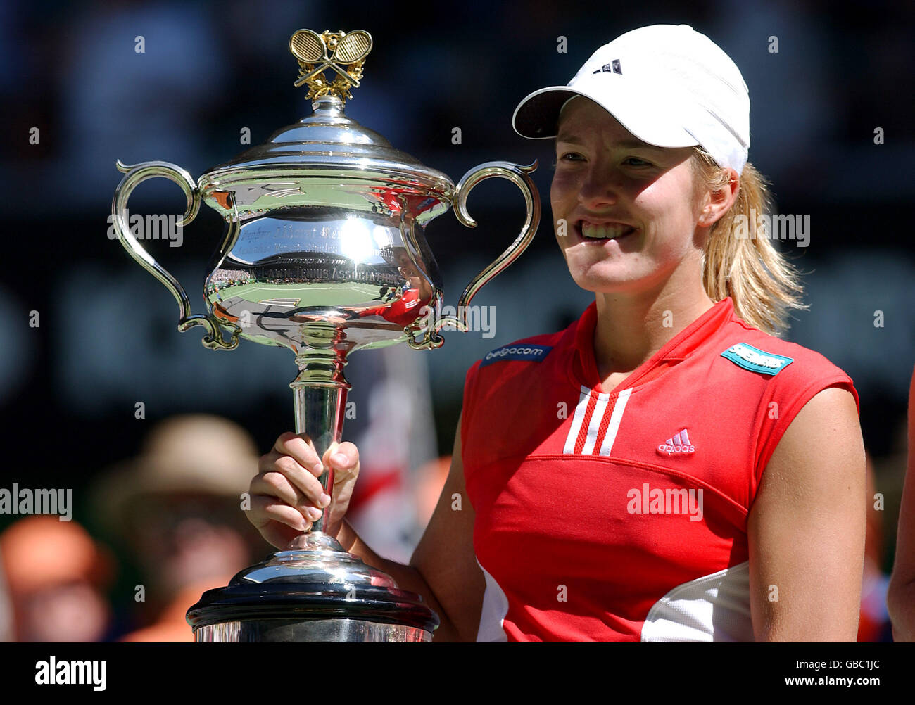 Justine henin hardenne with the australian open trophy hi-res stock ...