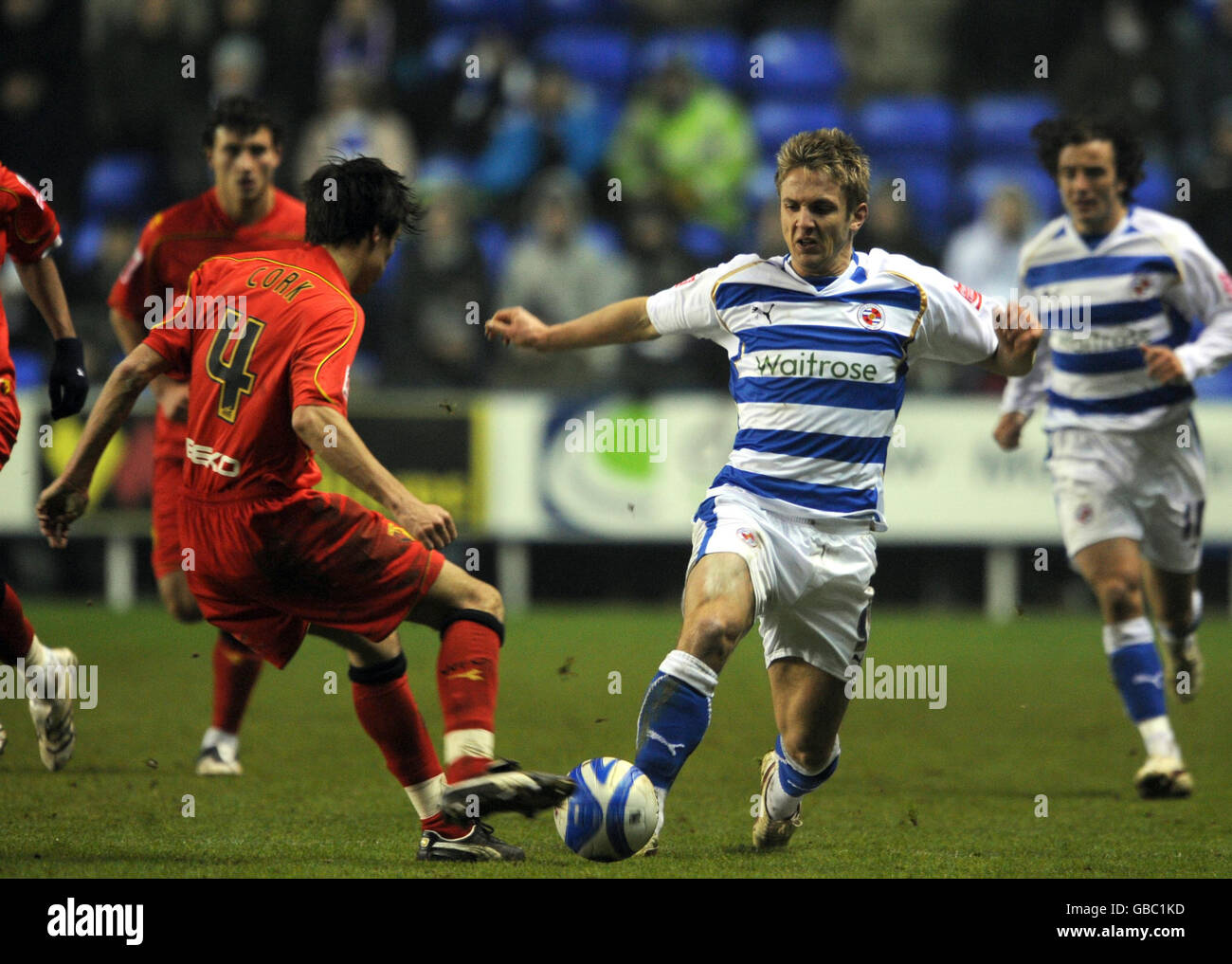 Reading's Kevin Doyle (centre) in action during the Coca-Cola ...