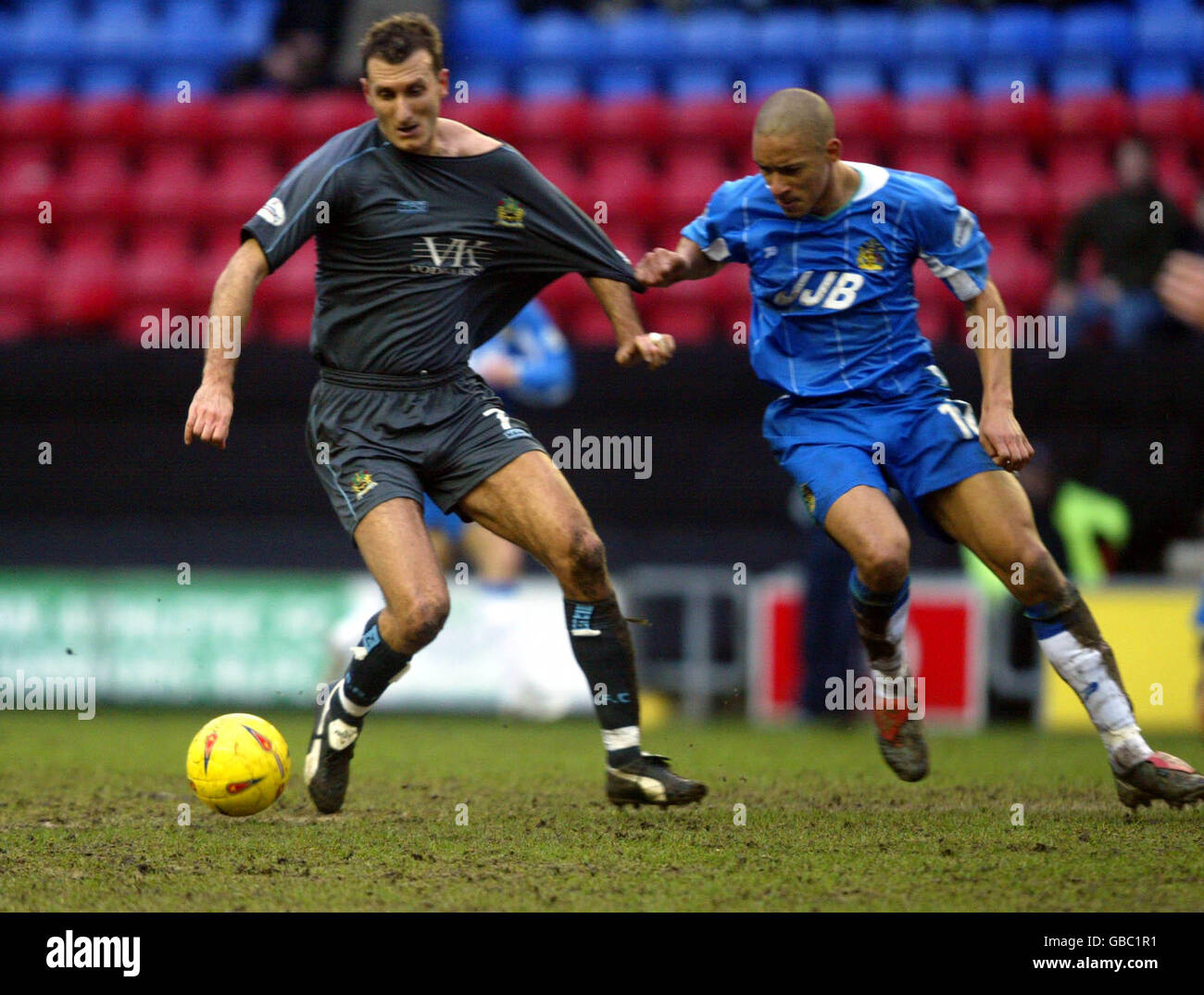 Wigan Athletic's Jason Jarrett and Burnley's Glen Little Stock Photo ...