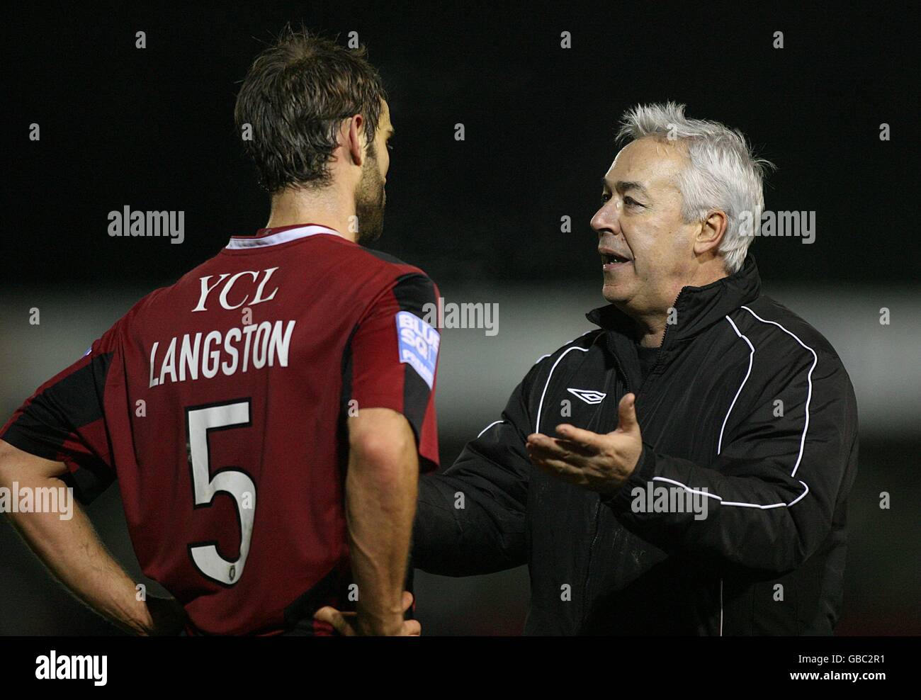 Histon's Matthew Langston is consoled by coach John Beck Stock Photo ...