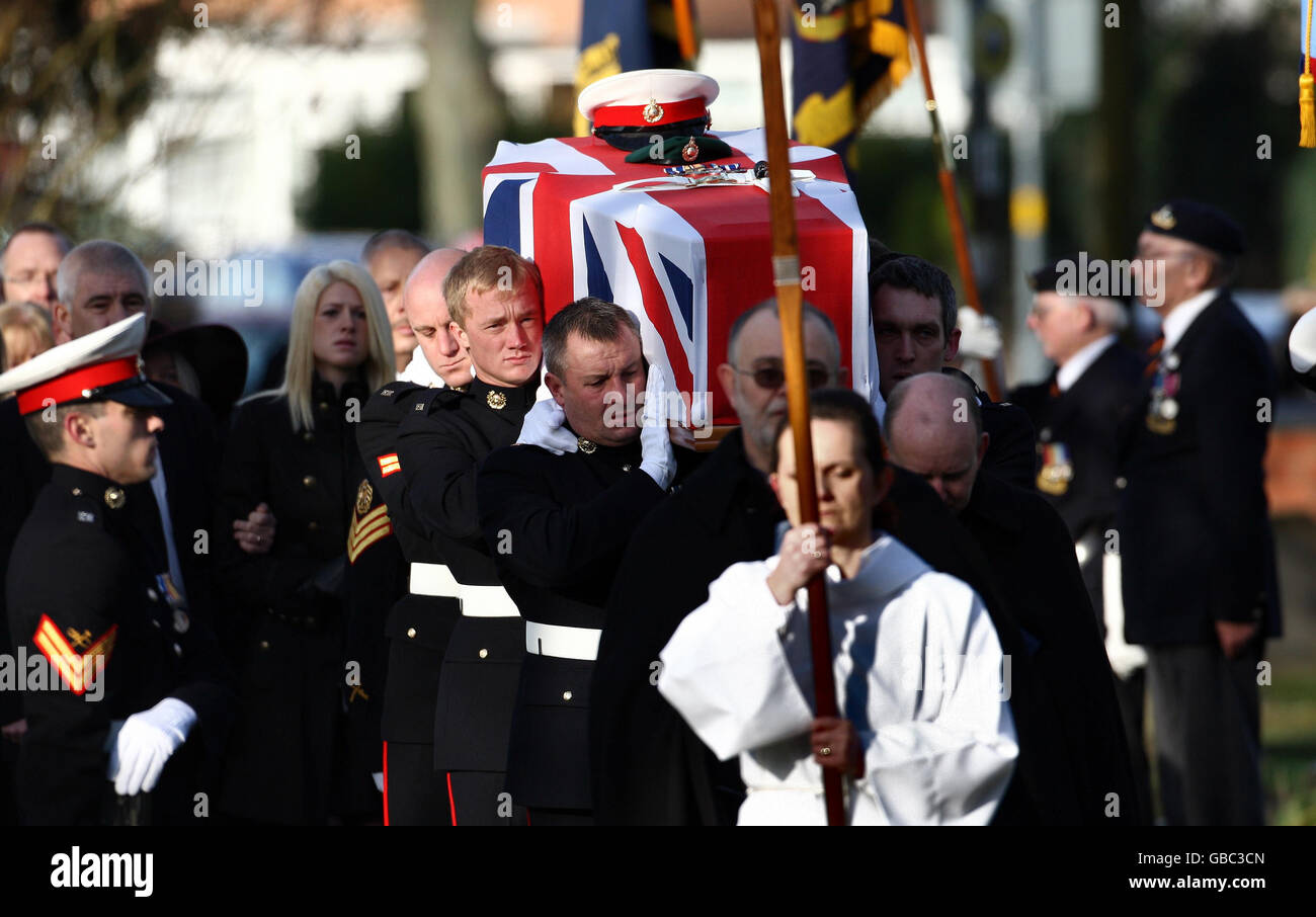 Royal Marine Corporal Robert Deering's coffin, followed by his fiancee ...