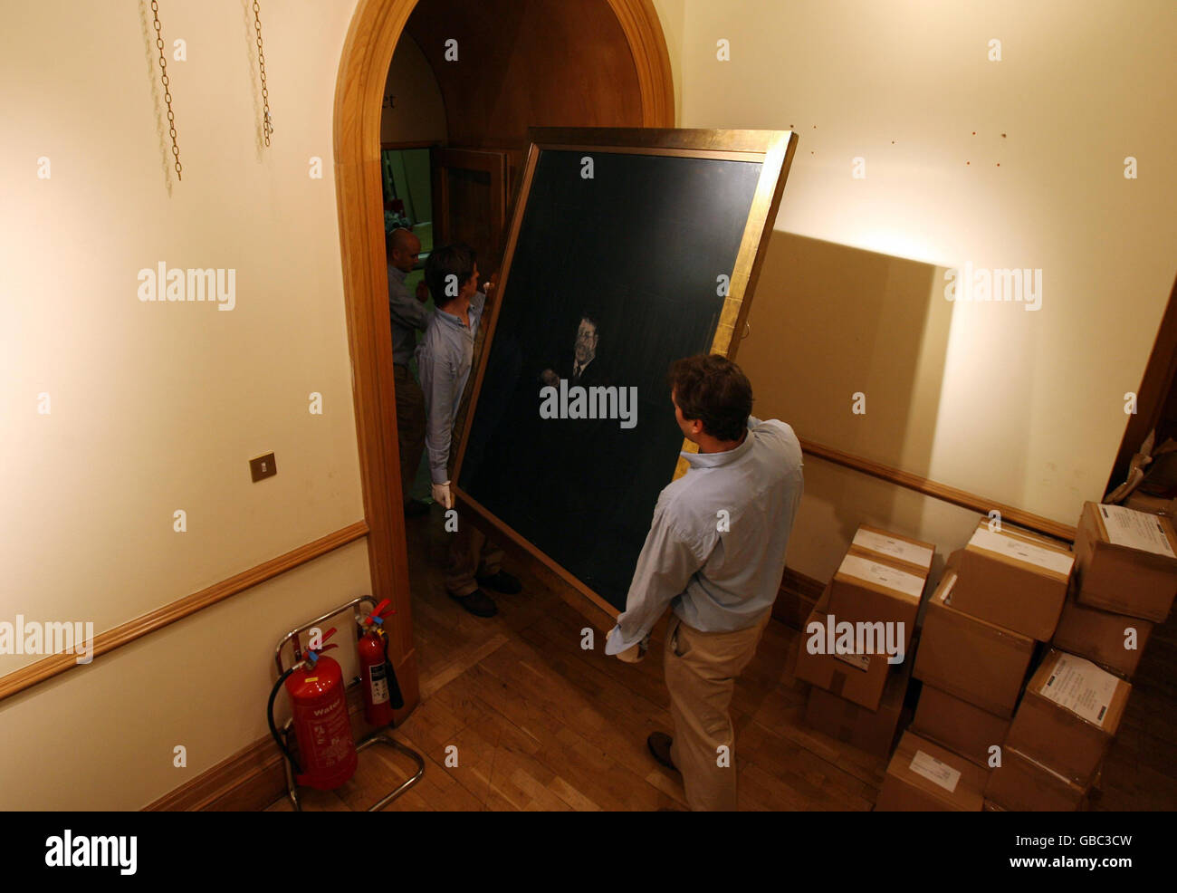 Christie's Matthew Lindop (centre left) and Joe McNally (centre right ...