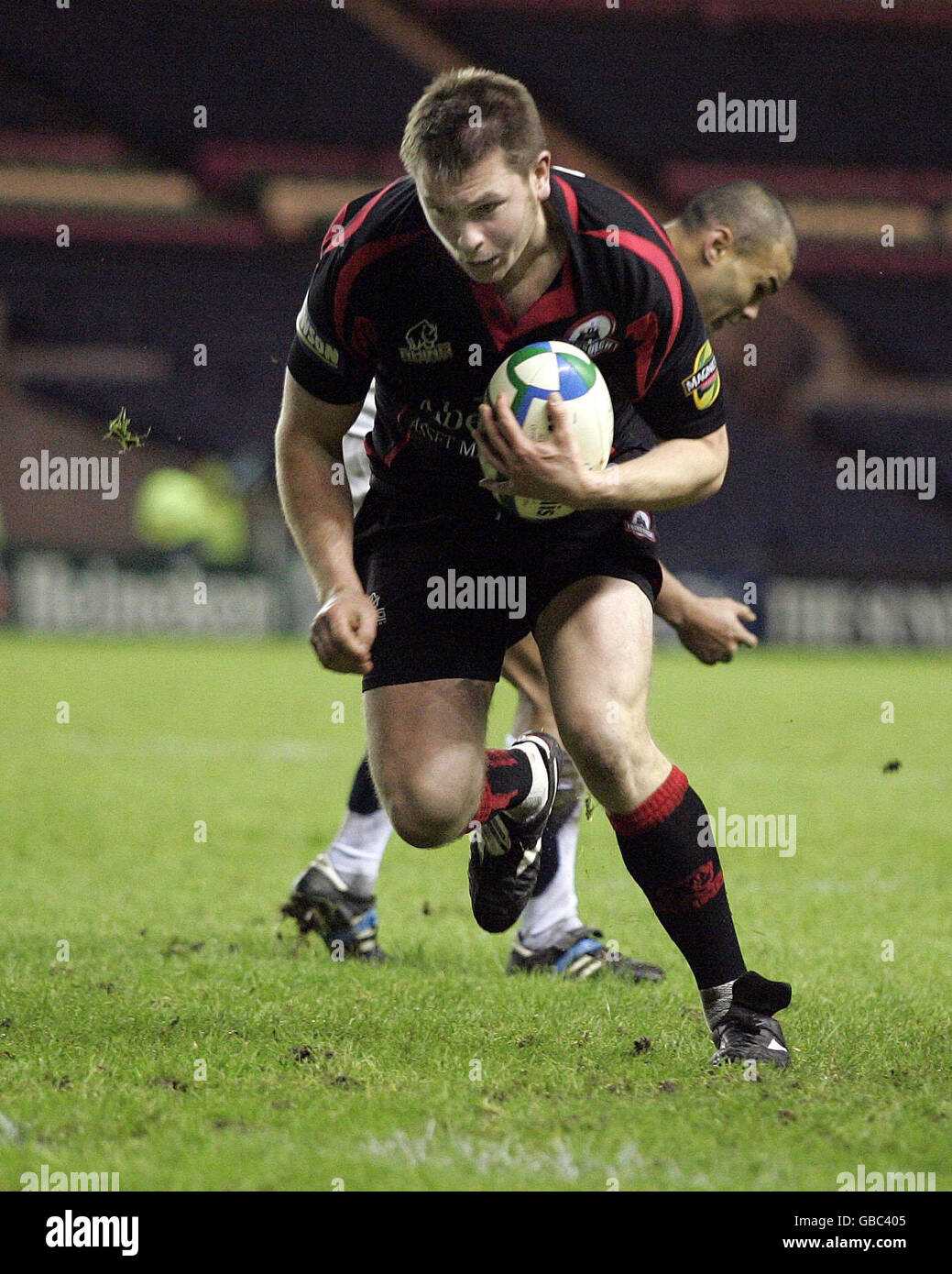 Andrew Kelly of Edinburgh scores the last try during the Heineken Cup ...