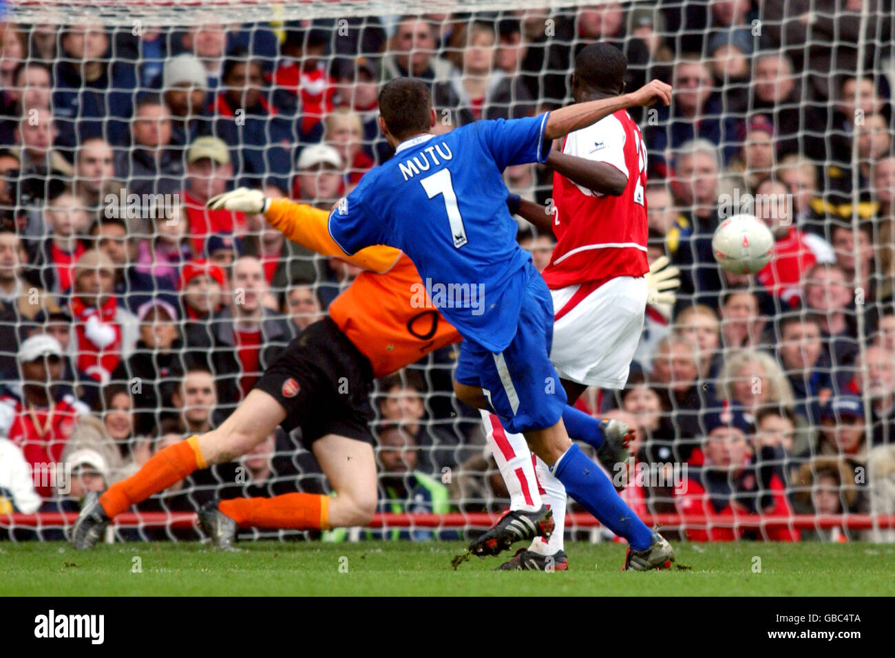 Chelsea's Adrian Mutu scores their opening goal past Arsenal's ...
