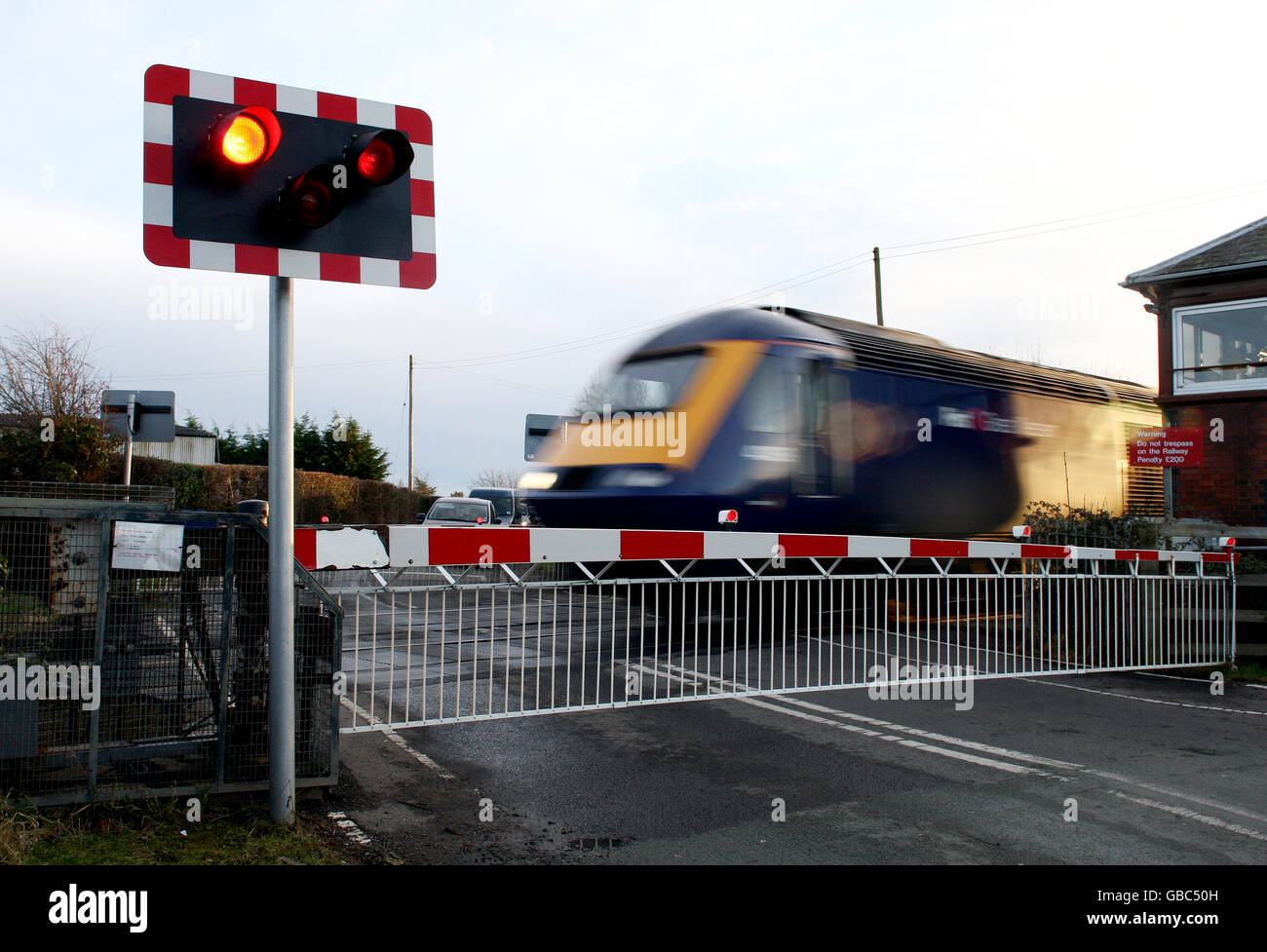 Train Level crossing stock Stock Photo - Alamy