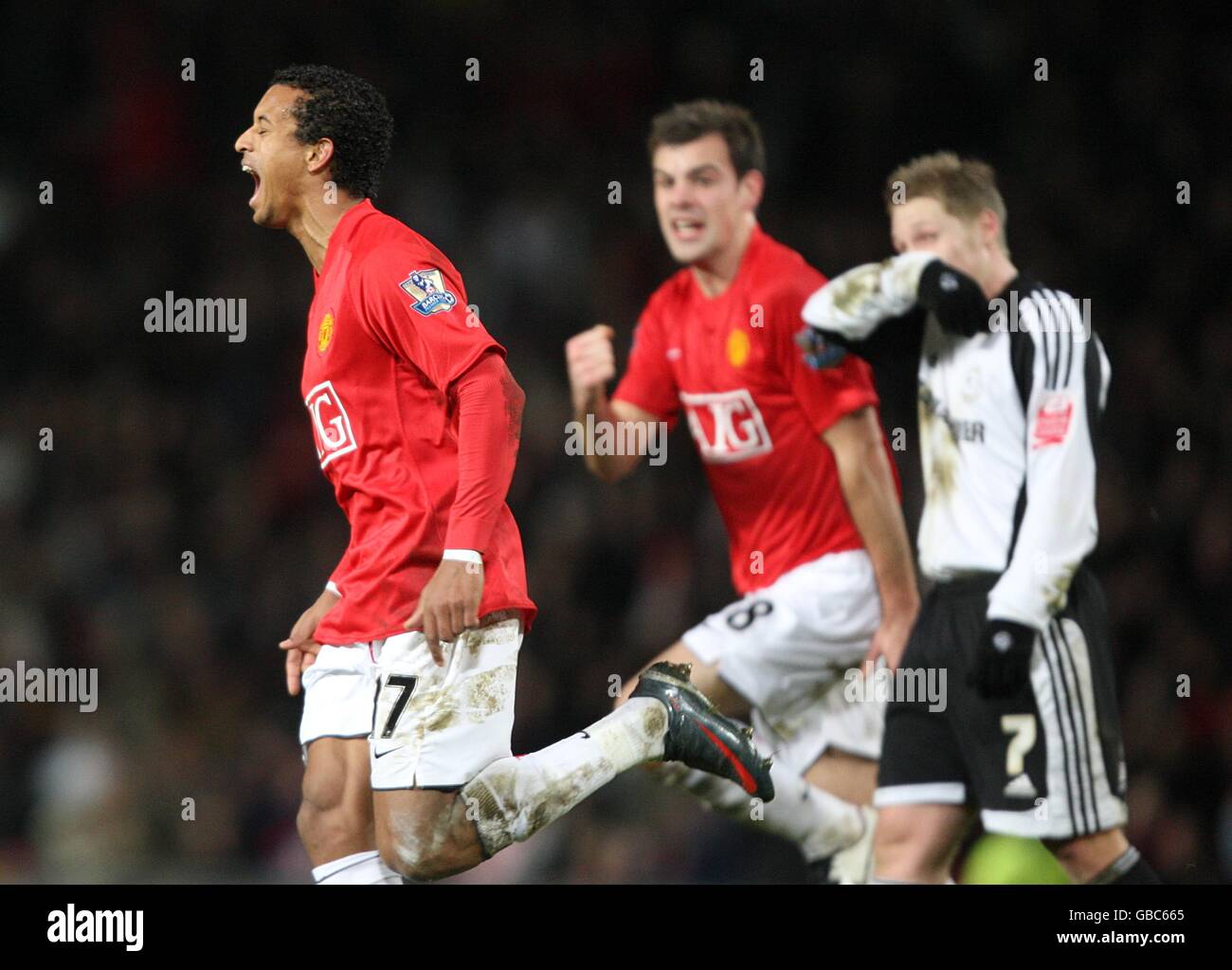 Manchester United's Luis Nani (l) celebrates scoring his sides first ...