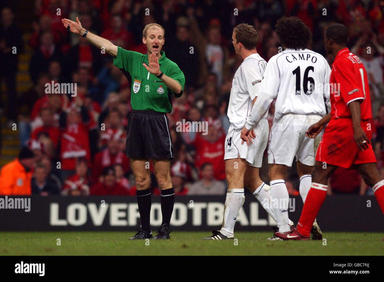 Referee Mike Riley (l) signals a free kick as Bolton Wanderers Kevin ...