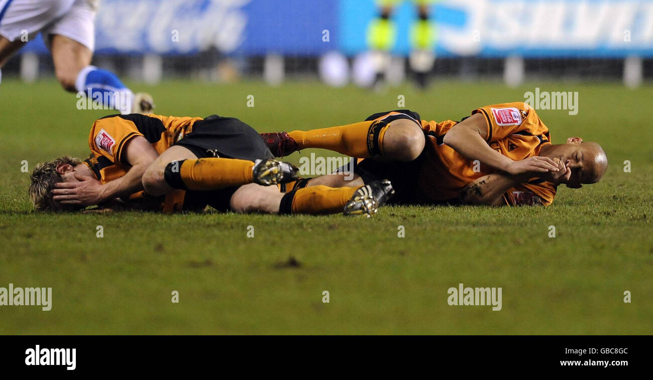 Wolves' Richard Stearman and Nigel Quashie lay on the floor after ...