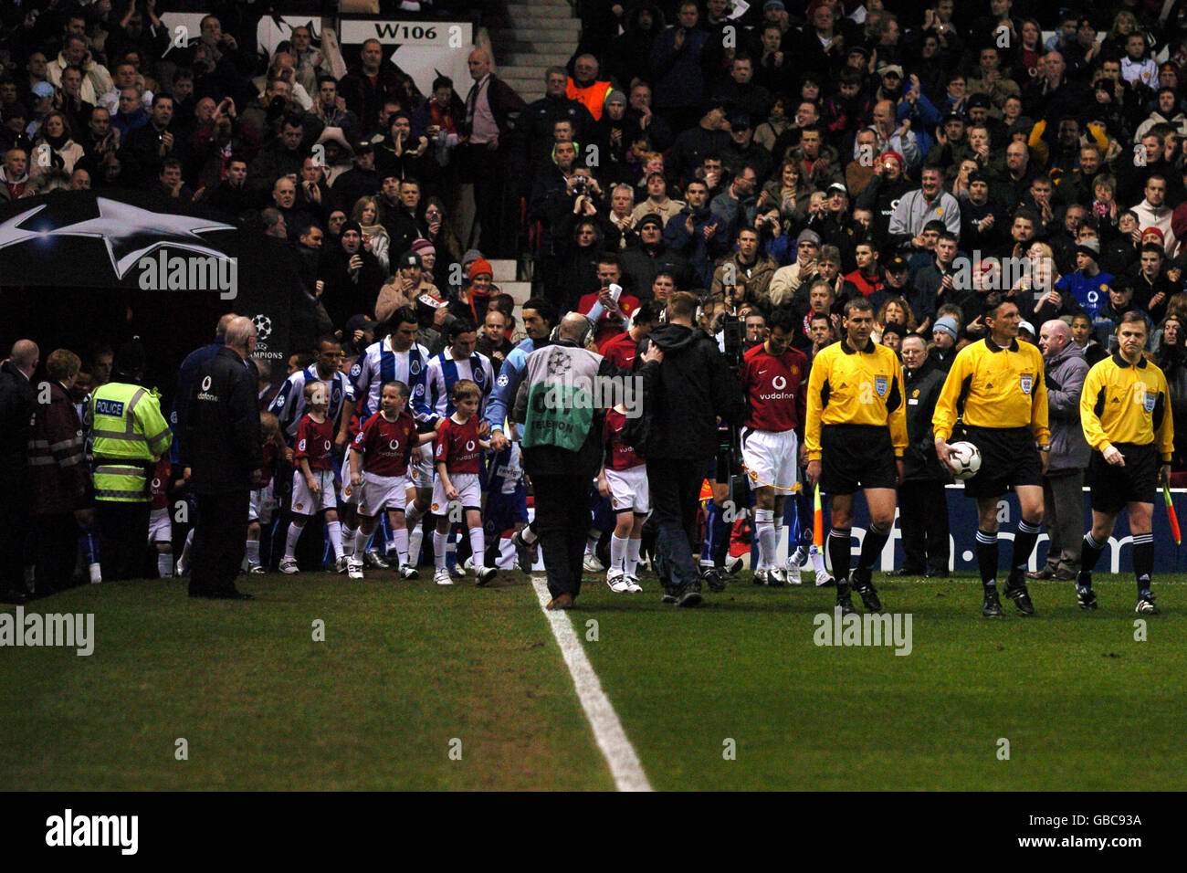 Mascots walk out with players onto pitch hi-res stock photography and ...