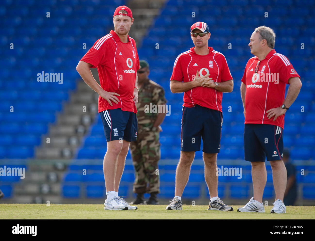 England's Andrew Flintoff with physio Kirk Russell and team doctor ...