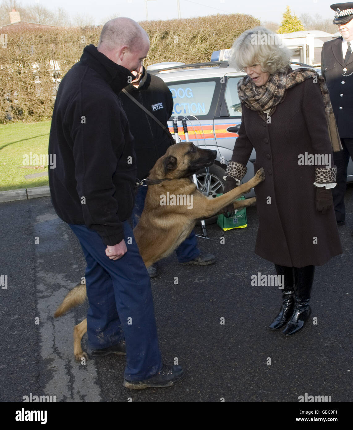 The Duchess of Cornwall is greeted excitedly by PC Graham Gower-Smith ...