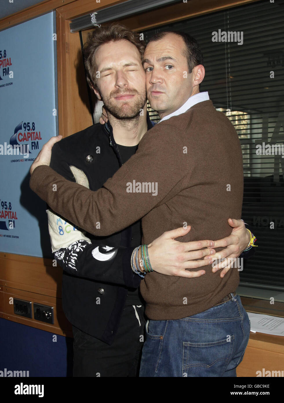 Capital Breakfast show presenter Johnny Vaughan with guest Chris Martin ...
