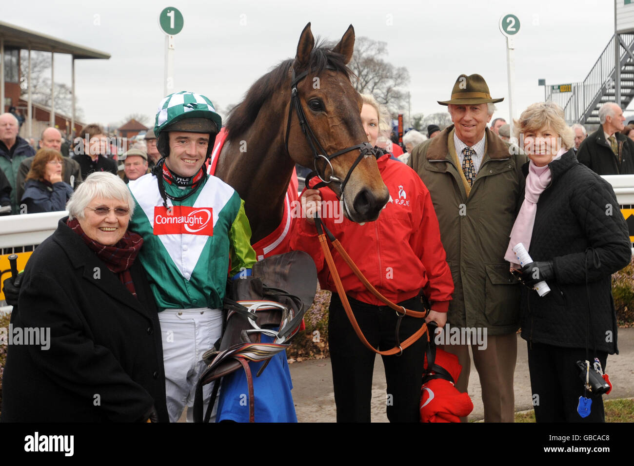 Winning Owners Paul Barber (second right) and Mrs M Findlay (left) pose ...