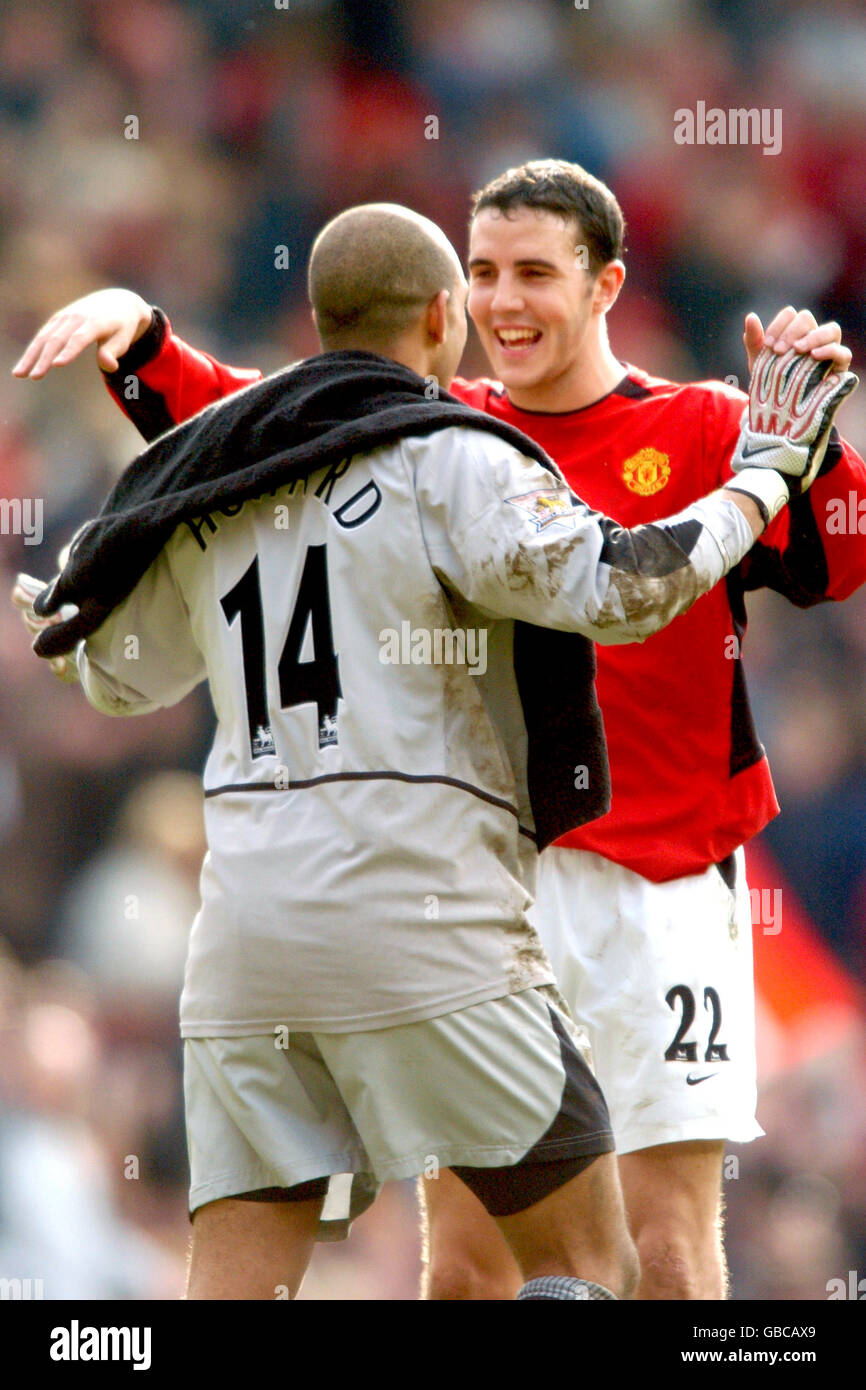 Manchester United goalkeeper Tim Howard (l) and teammate John O'Shea (r ...