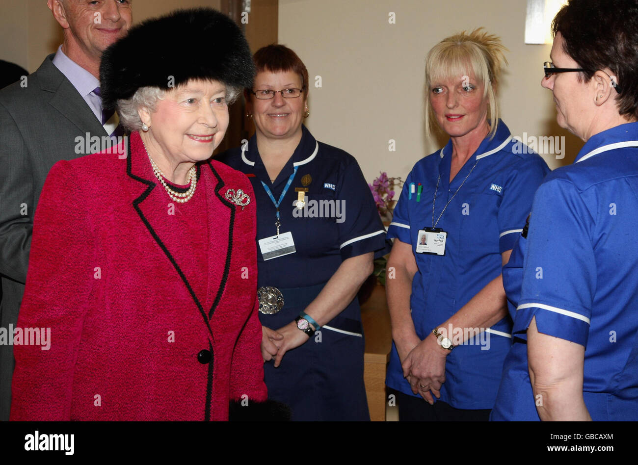 Queen Elizabeth II meets nurses as she is taken on a tour of the Carole ...