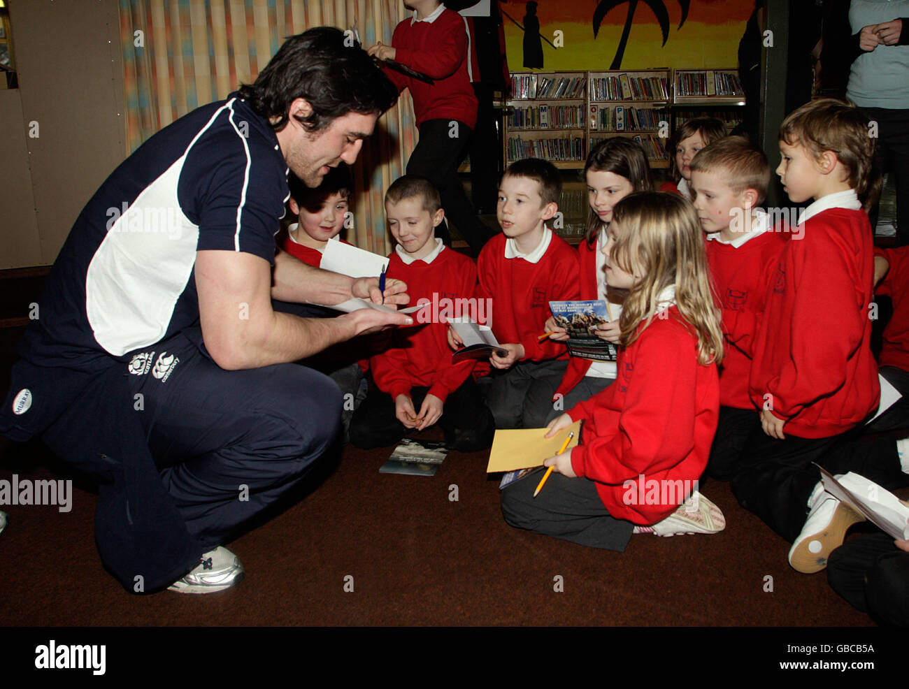 Scotland squad member Kelly Brown signs autographs at Balmullo Primary ...