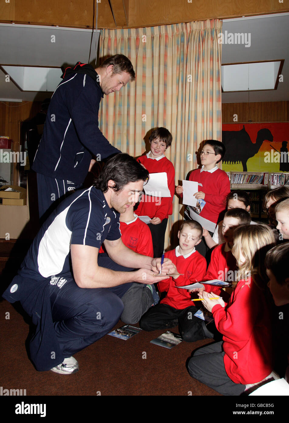 Scotland squad members Kelly Brown, and Craig Hamilton sign autographs ...