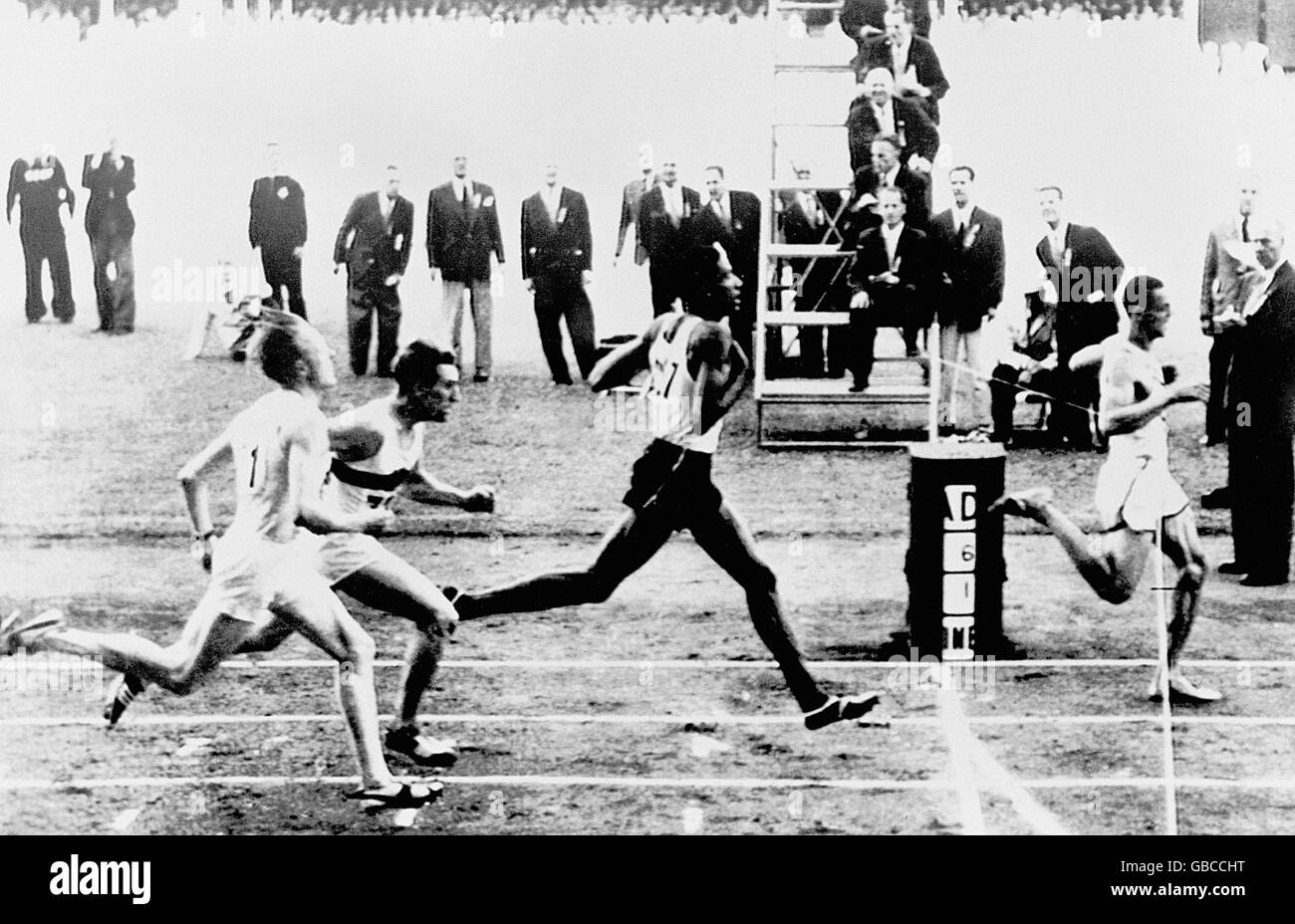 USA's Mal Whitfield (r) breaks the tape to win gold from Jamaica's ...