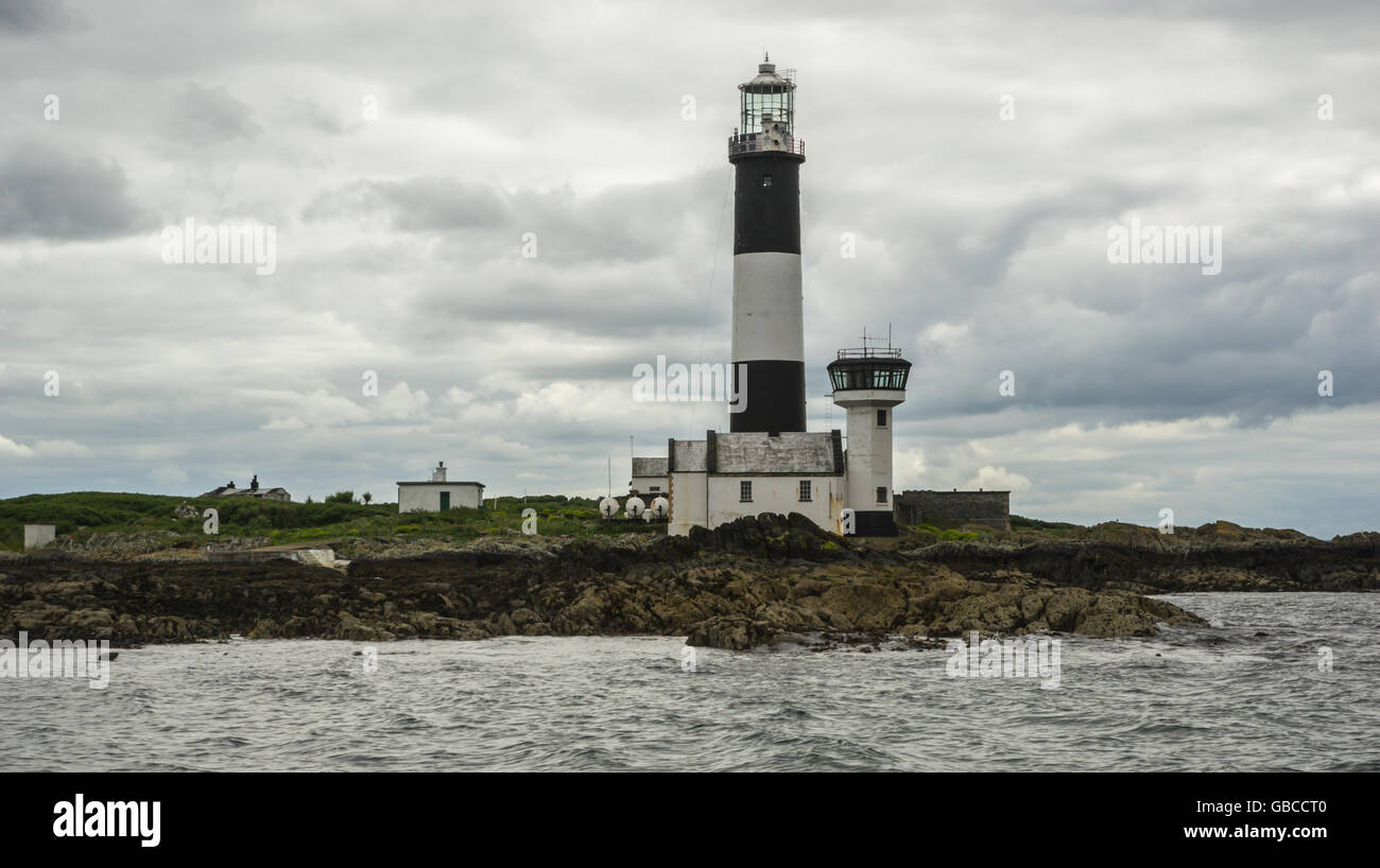 Lighthouse at Mew Island Stock Photo - Alamy