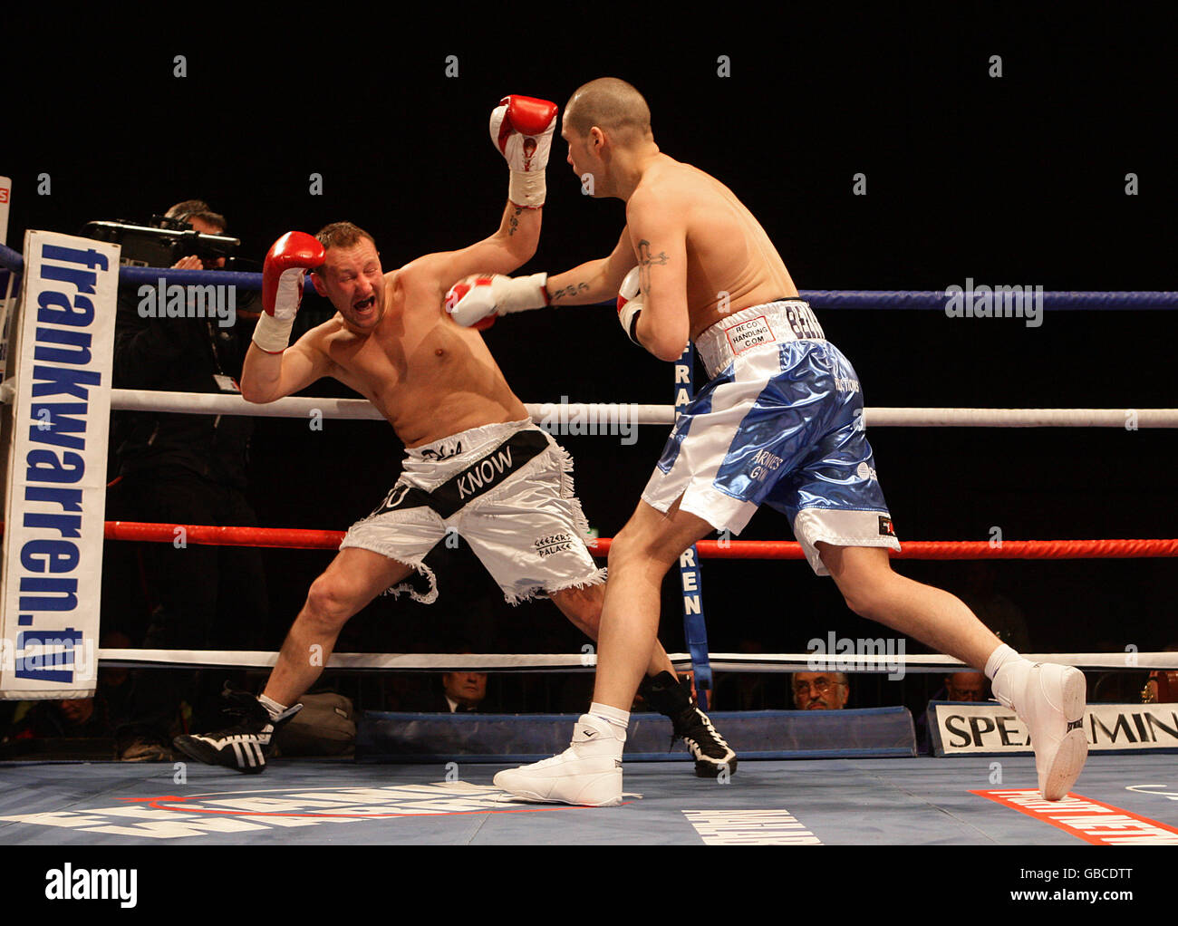 Liverpool's Tony Bellew (right) in action with Hull's Phil Goodwin ...