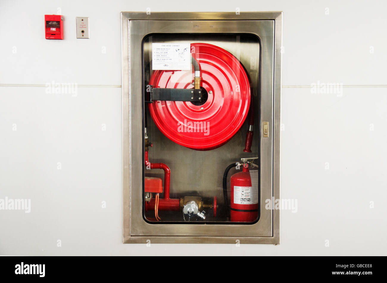 Emergency fire equipment station for firefighter and caution label in ...