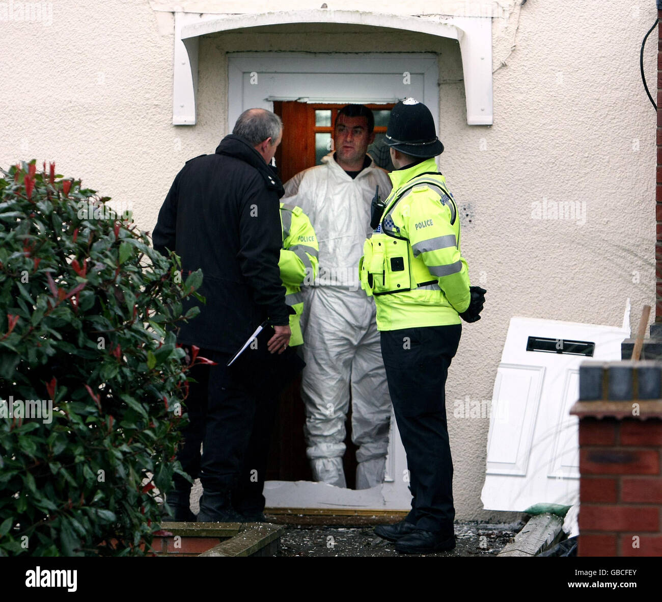 Police forensic officers at a house in Shirley, Birmingham, after five ...
