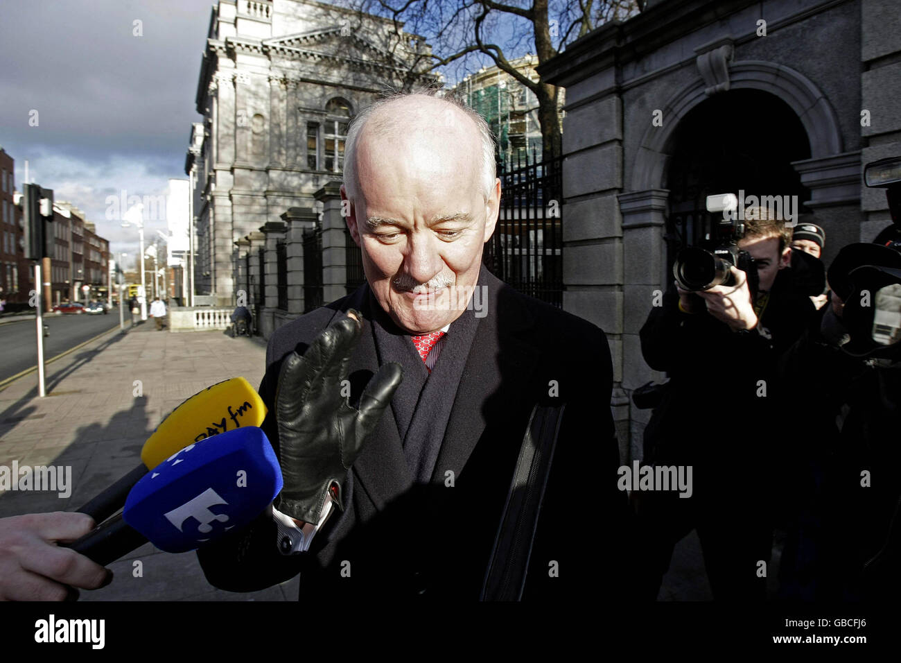 Outgoing Financial Regulator Patrick Neary arrives to be questioned at ...