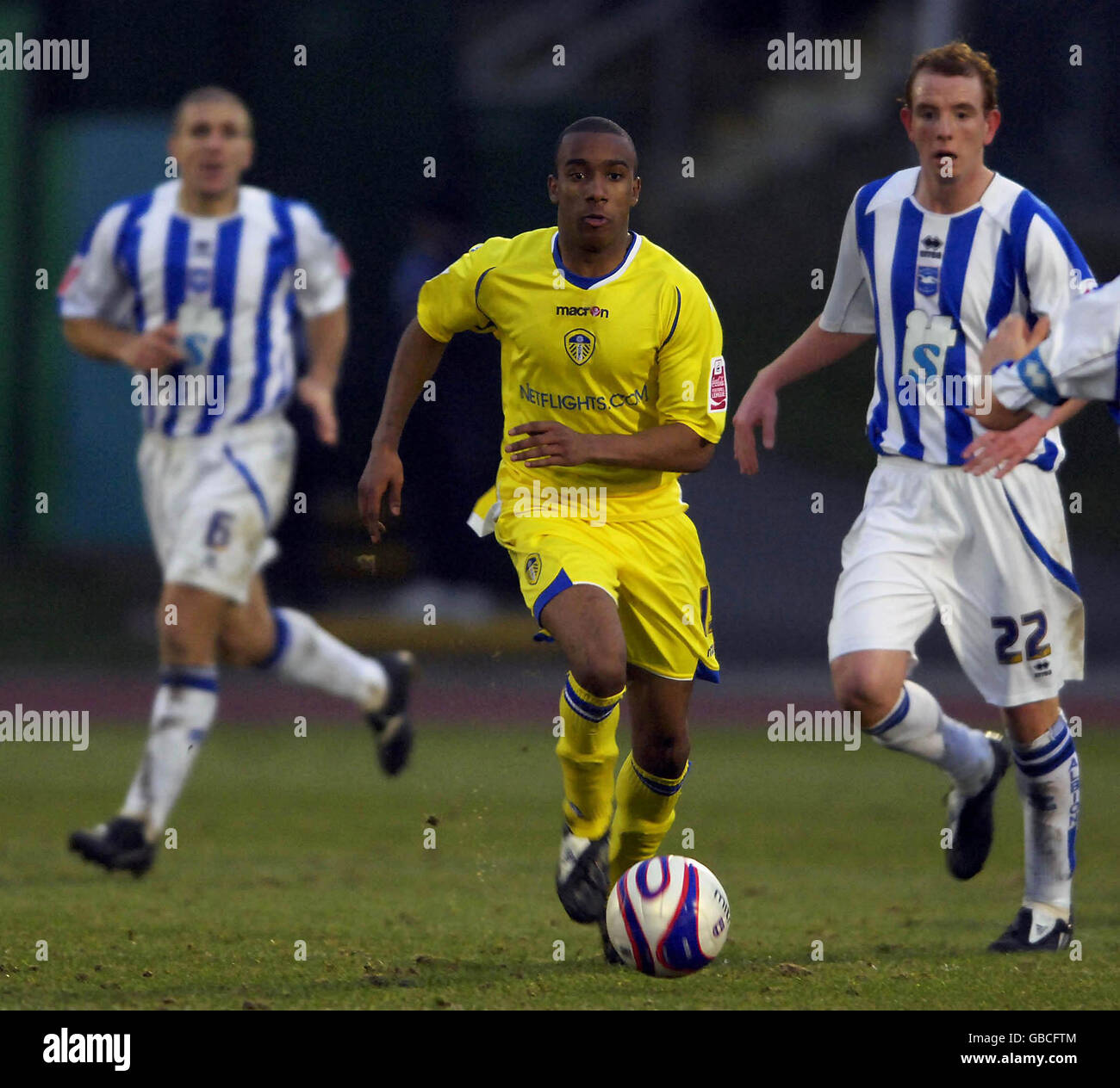 Leeds United's Fabian Delph dribbles through the Brighton defence ...