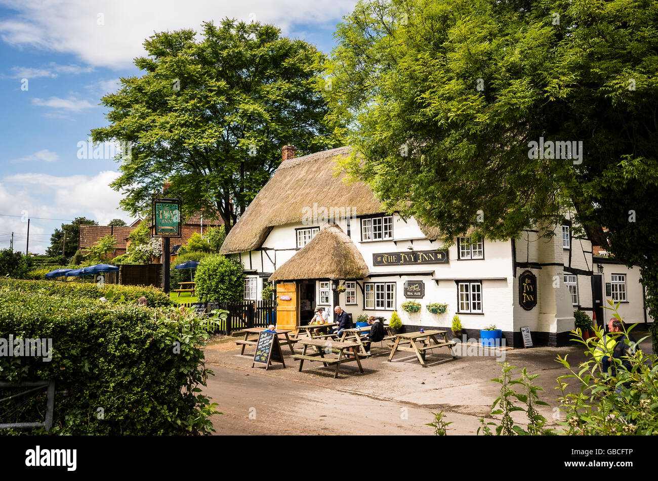 Thatched English public house the Ivy Inn in Heddington Wiltshire ...