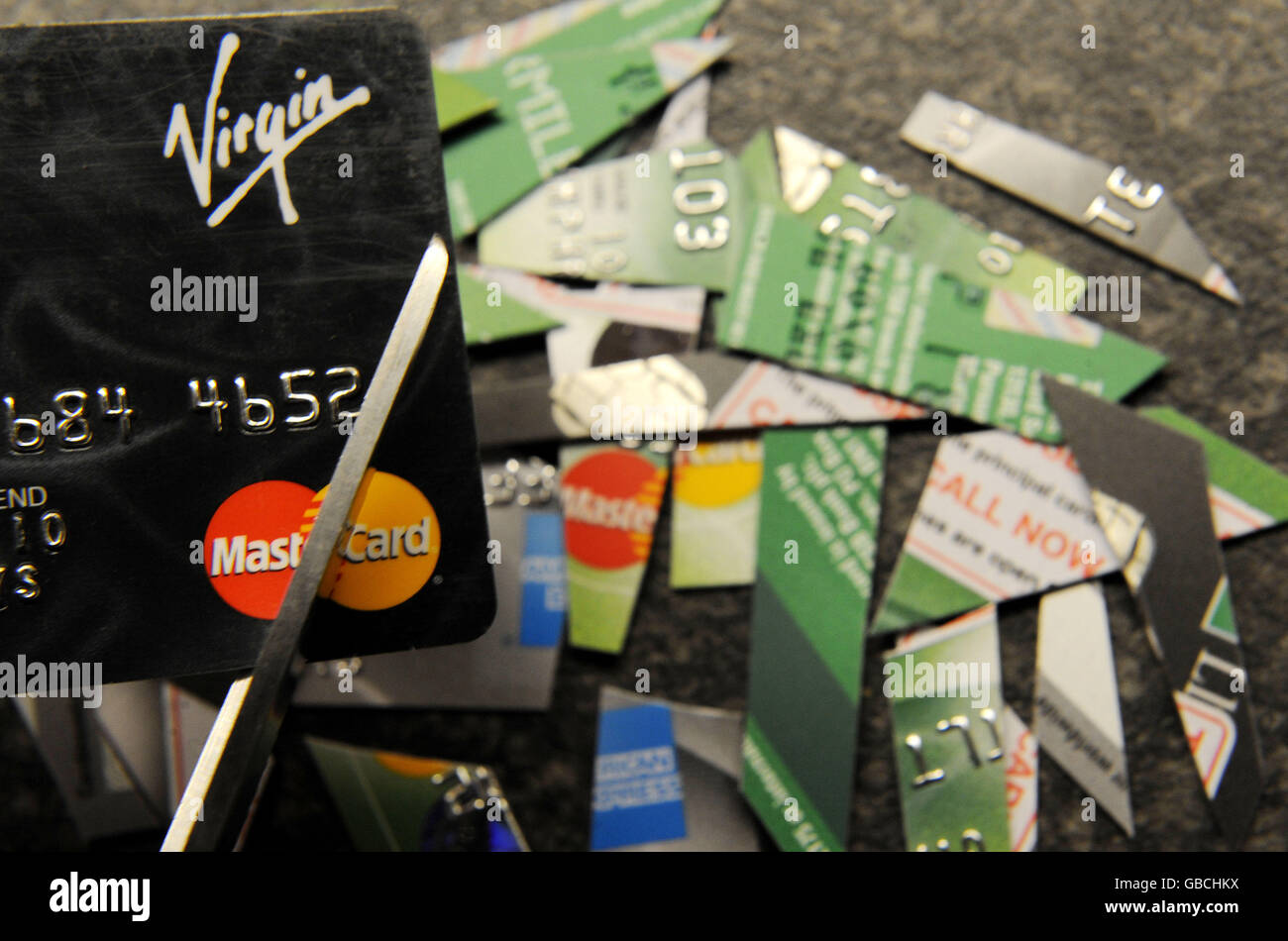 Cutting up credit cards hi-res stock photography and images - Alamy