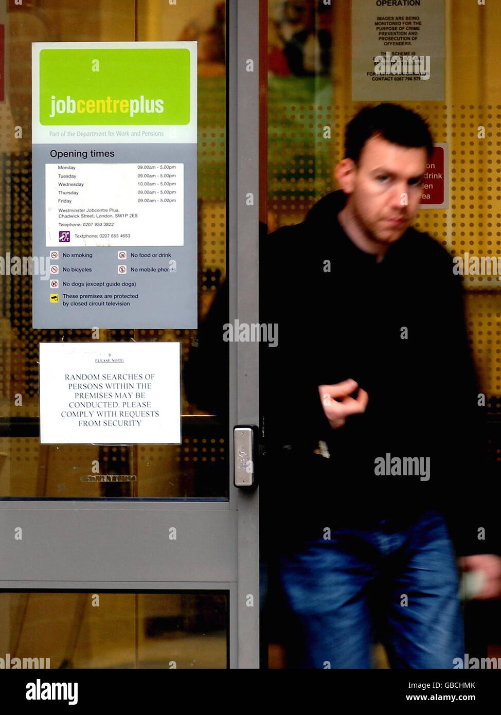 A man leaves a Job Centre Plus in Westminster, London, as record ...