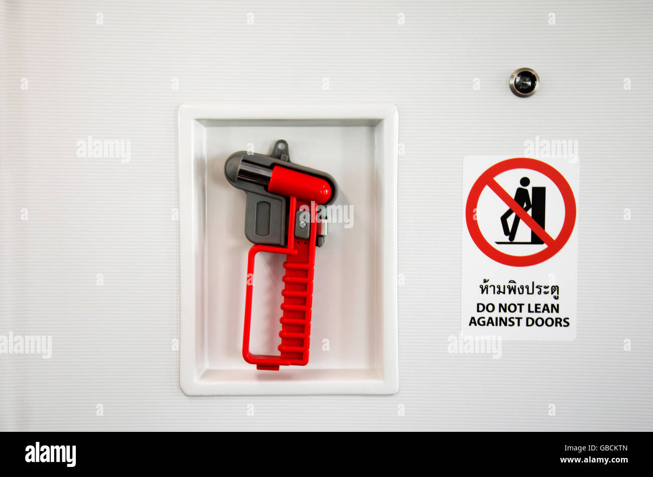 Emergency tools car mirror smash hammer and caution label inside of MRT ...