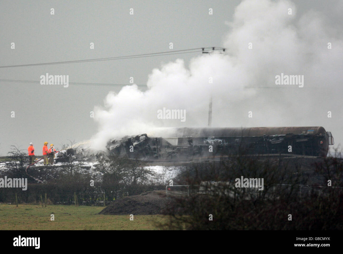 Firefighters at the scene of an 'intensive' blaze after a freight train ...