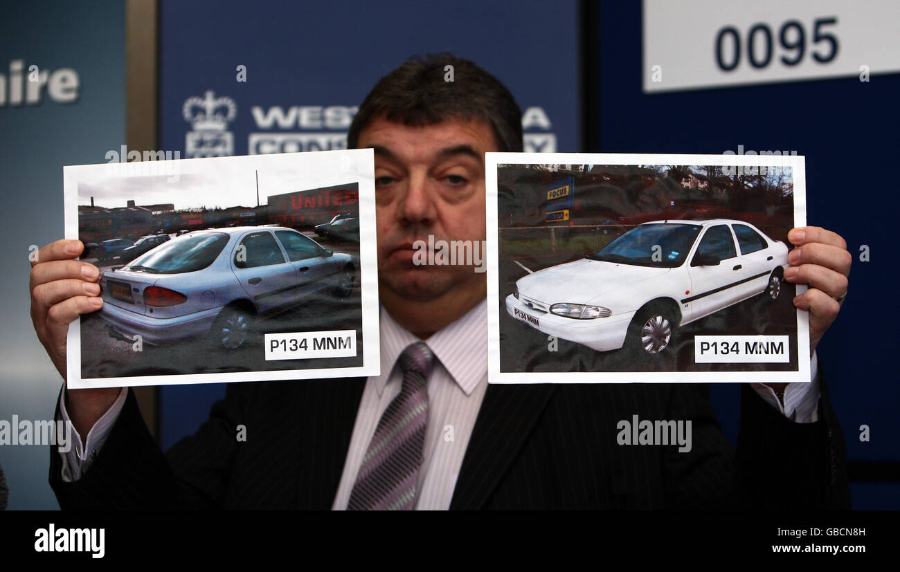 Detective Superintendent Jon Groves of West Mercia Police holds up ...